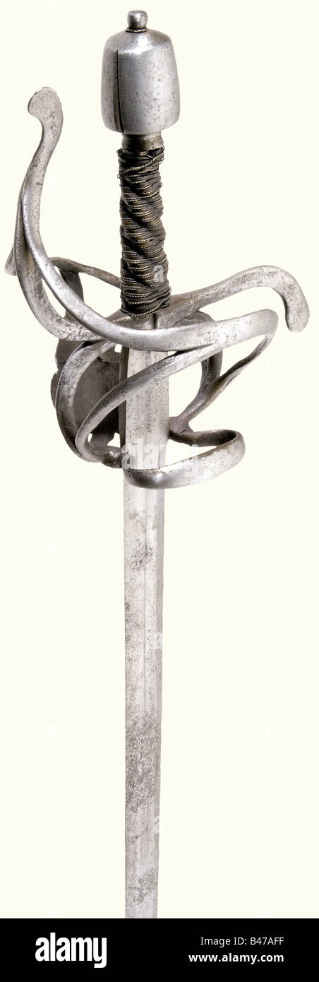 A rapier, German, circa 1610 A double-edged, thrusting blade (some ...
