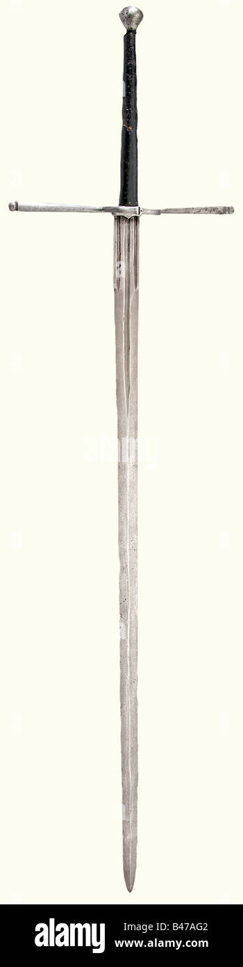 A two-handed sword, Italian, circa 1560 A straight, double-edged blade ...