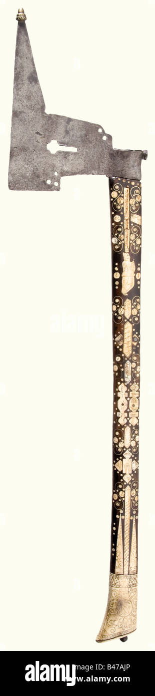 A miner's axe, Saxony, dated 1658 Jagged iron blade with cross and ...