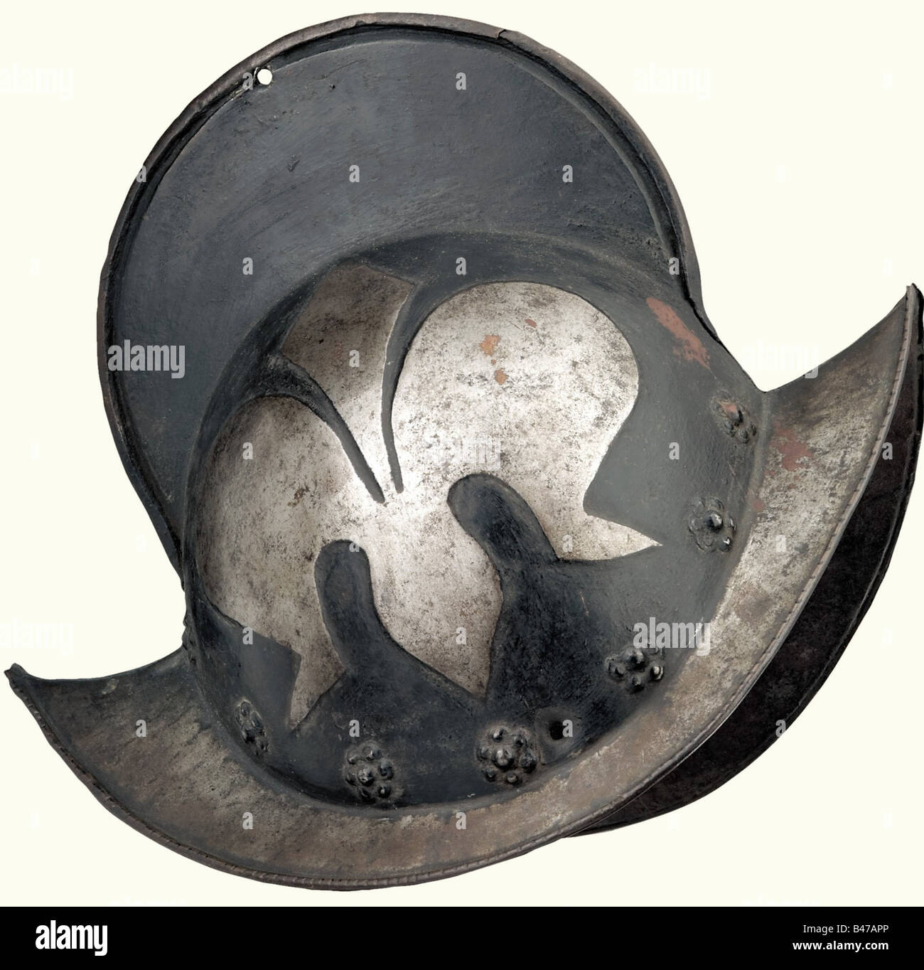 A black and white morion, Southern German, circa 1590 A two-piece skull ...