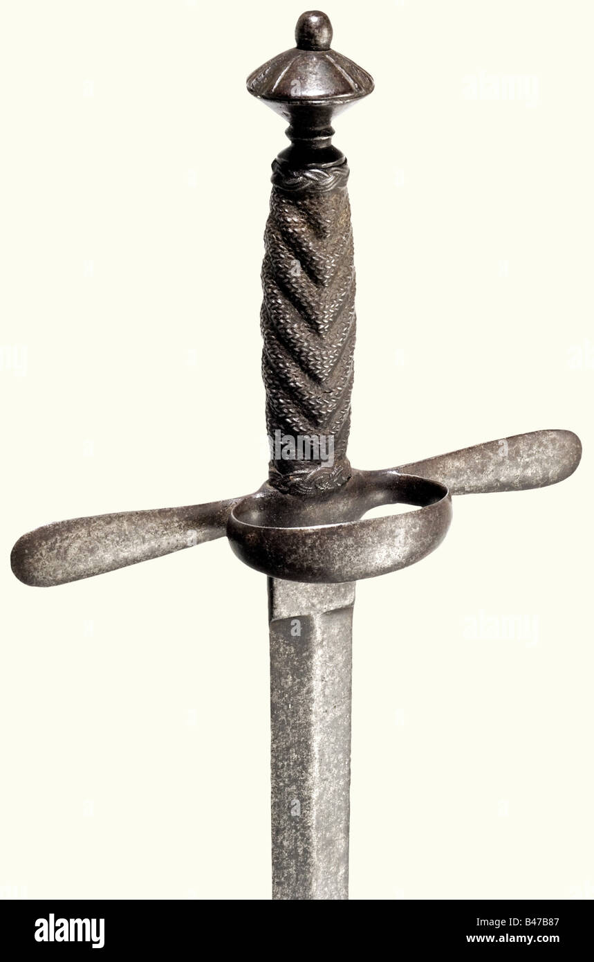 An Italian left-hand dagger, circa 1600. Double-edged blade with ridges ...