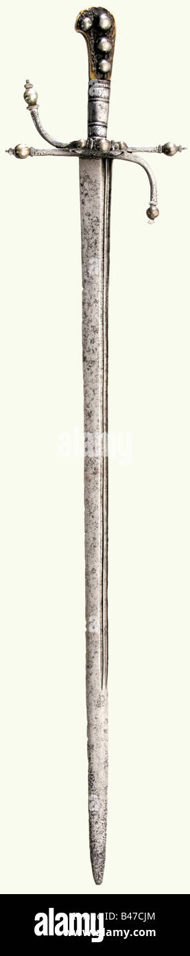 A German hunting sword, circa 1650. A single-edged blade, with double ...