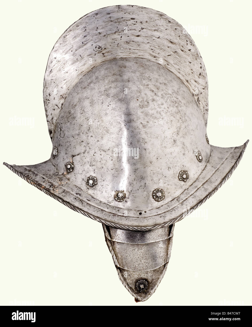 A morion with cheek pieces, Nuremberg, circa 1600. Skull forged in one ...