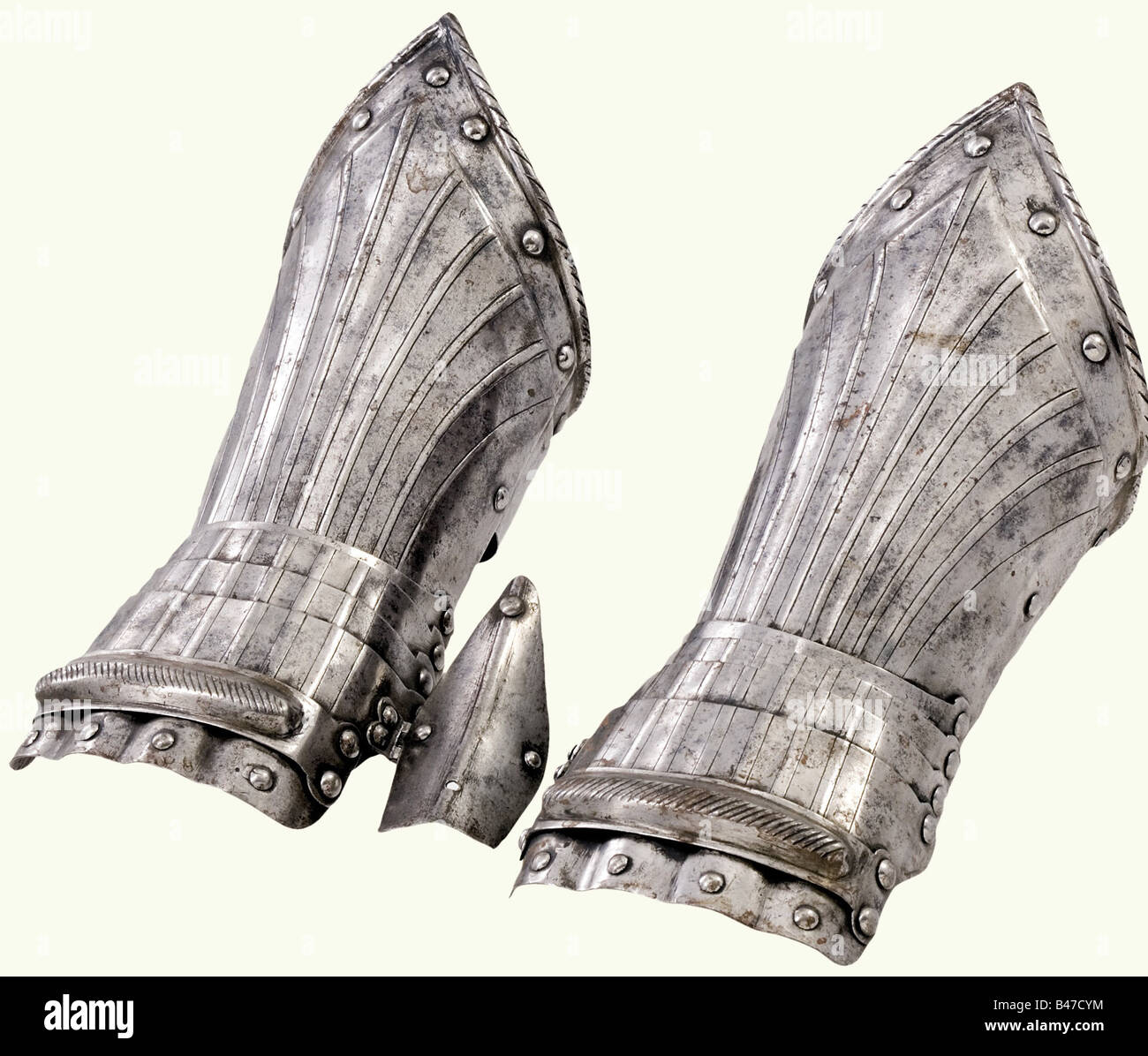 A German pair of fluted gauntlets, circa 1520/30. Gauntlets with four ...