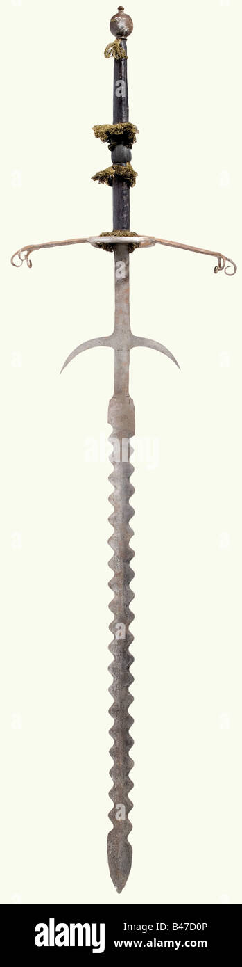 A two-handed flamberge, historical, reproduction using an original ...