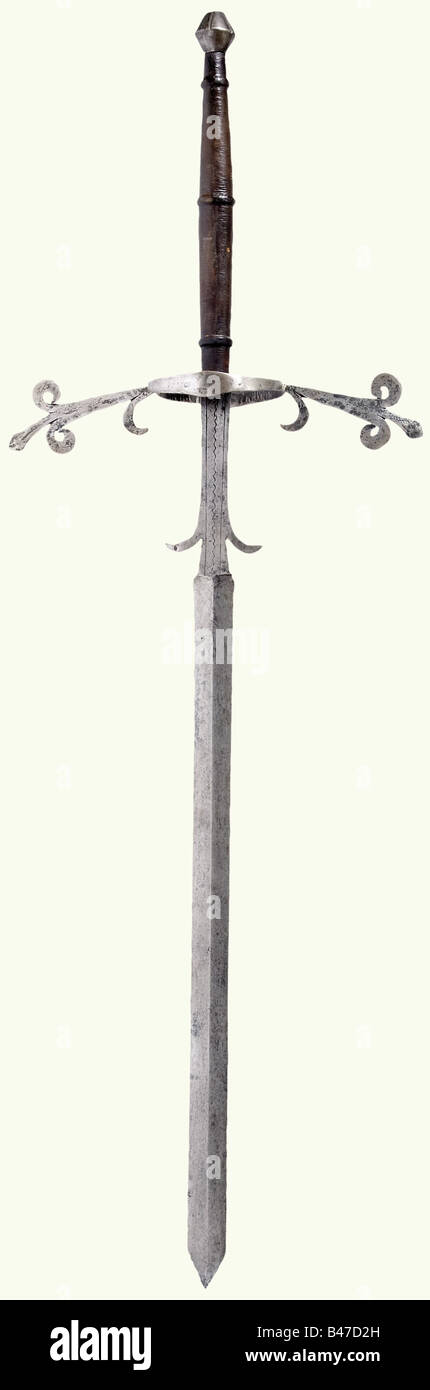 A German two-handed sword, circa 1580. Massive, slightly ridged blade ...