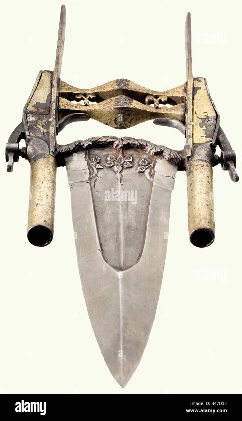 An Indian katar with two percussion pistols, circa 1850. Heavy, double ...