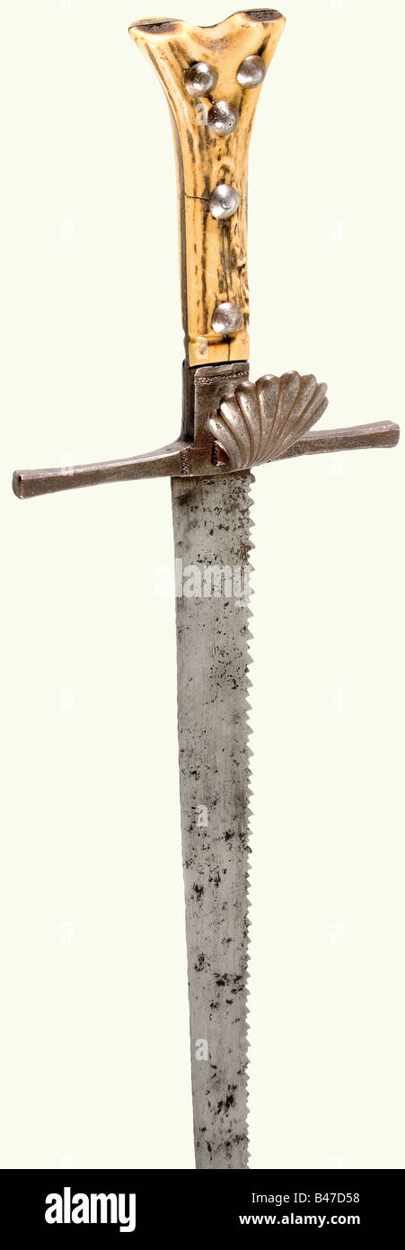 A German hunting sword, 1st half of the 17th century. Heavy blade with ...