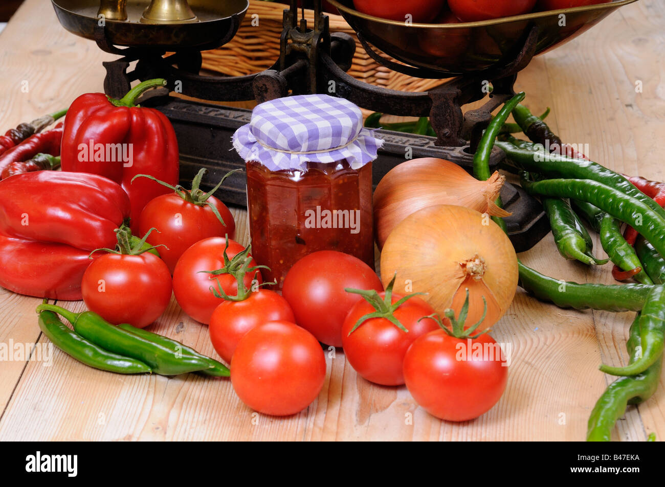Country Kitchen scene with chutney ingredients jar of home made chutney ...