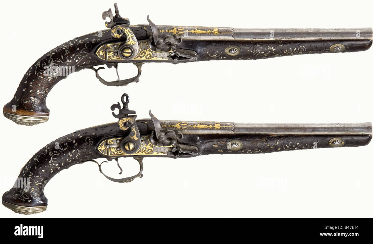 A pair of silver-mounted flintlock pistols, Southern France, circa 1800 ...