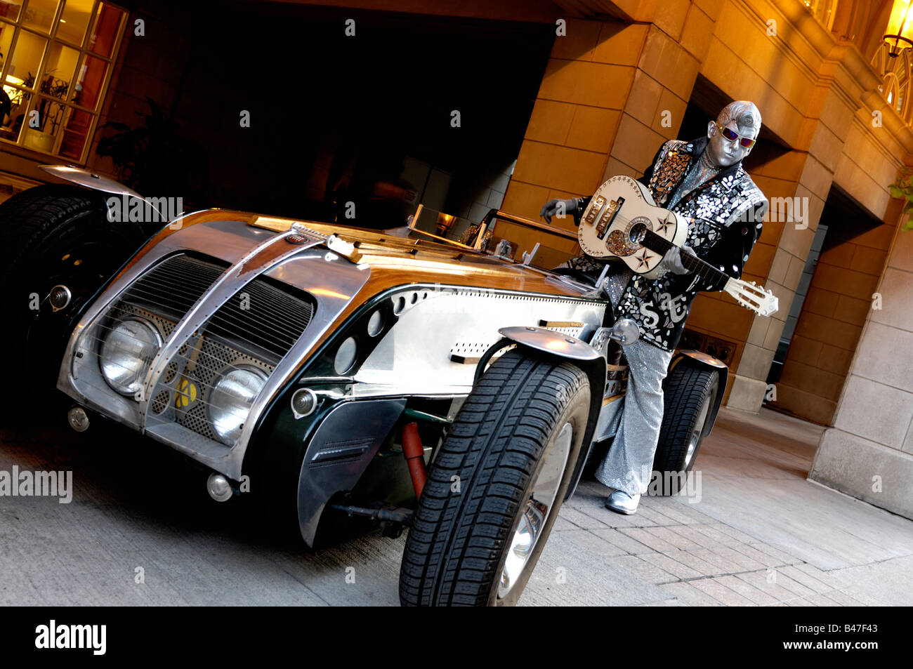 License available at MaximImages.com - Silver Elvis with a guitar and ...