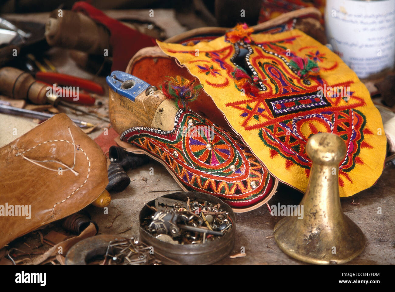 Colorful traditional Berber shoes at a shoe-maker workshop in Ghadamis ...
