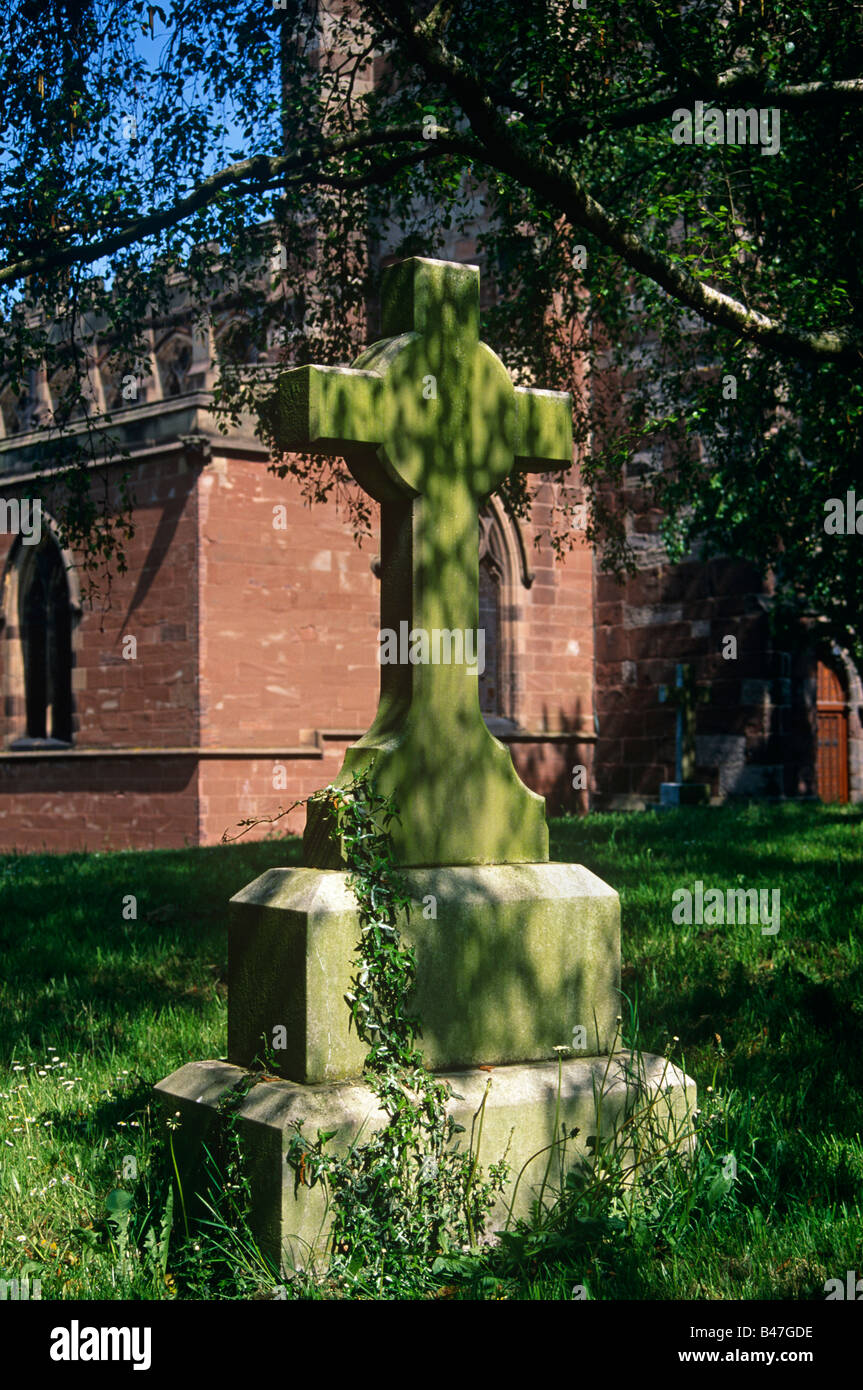Gravestone Ivy Green grass Brick building behind GRAVESTONE Stock Photo ...