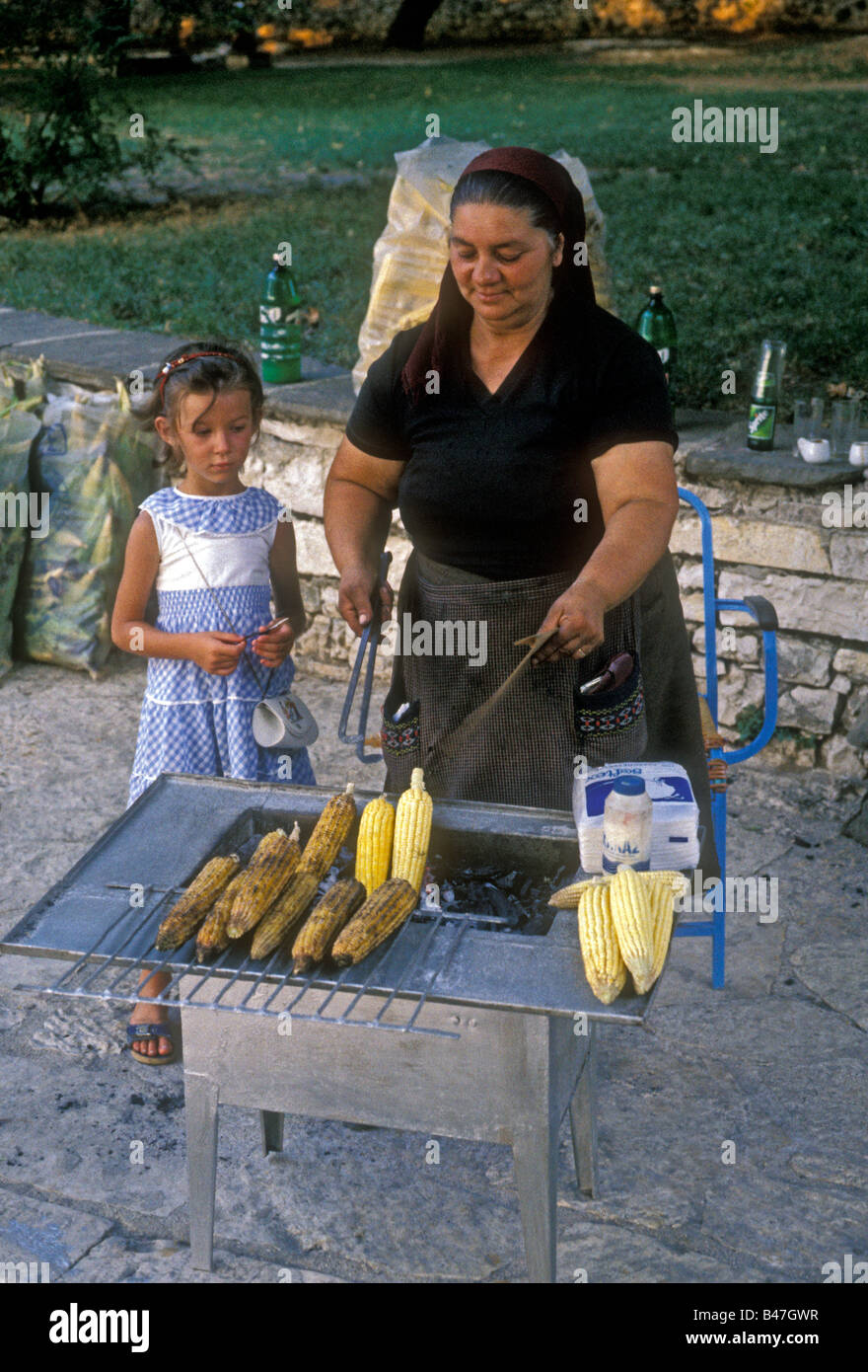 Greek woman, Greek woman, cooking corn, selling corn, vendor, Greek ...