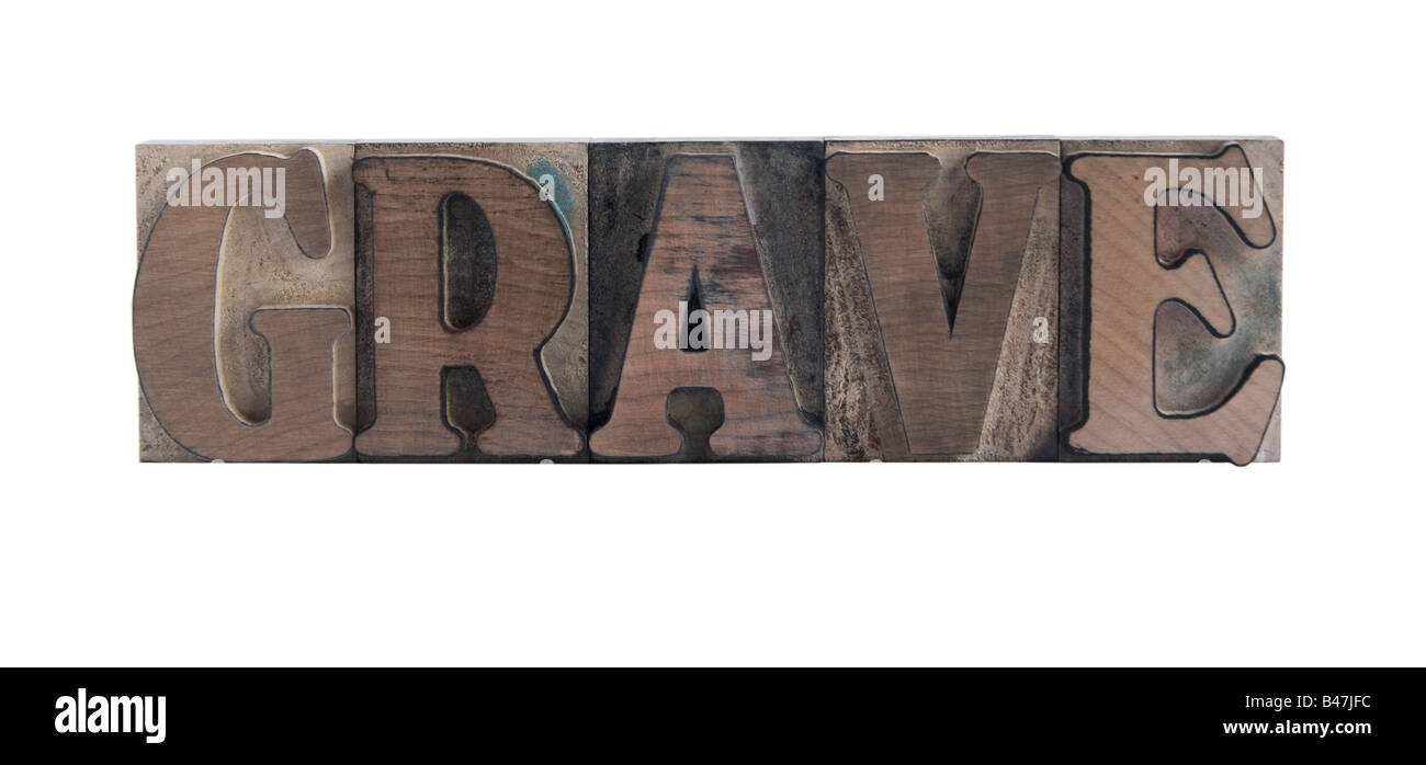 the word 'grave' in old, ink-stained wood type Stock Photo - Alamy