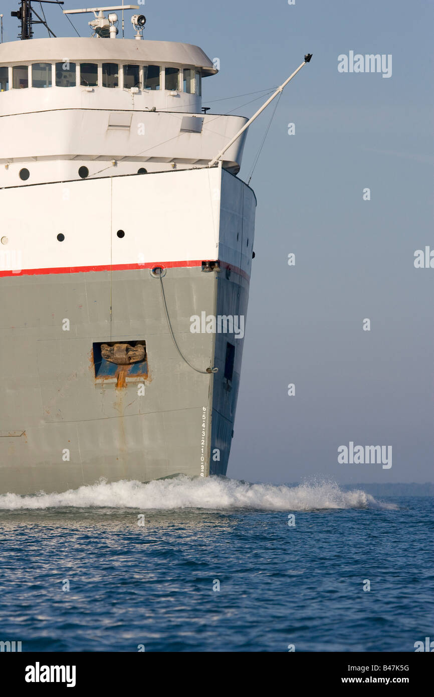A close-up of the bow and pilot house on a Great Lakes freighter as it ...