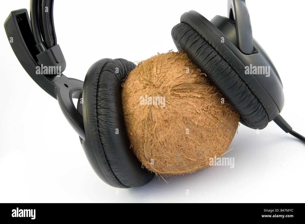 headphones on coconut isolated on white Stock Photo - Alamy