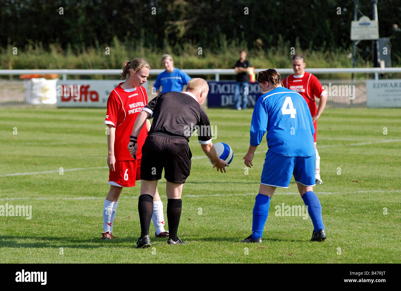 Referee doing drop ball in women`s football at club level, Leamington ...