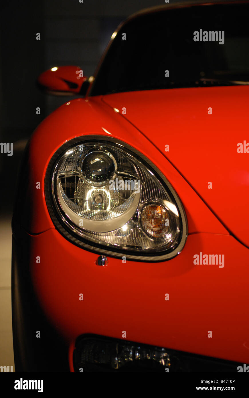 Headlights of a red luxury car Stock Photo - Alamy