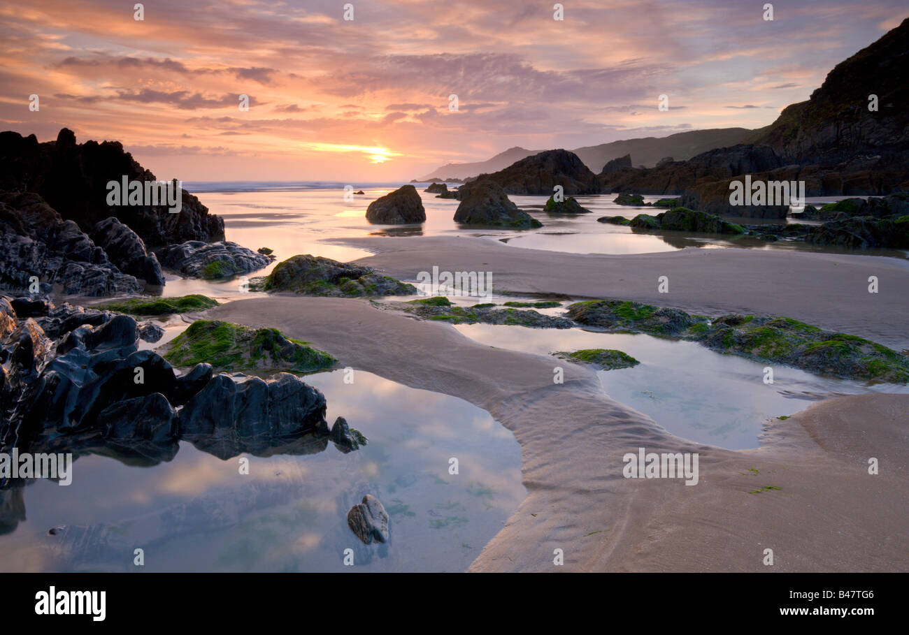 Sunset on Combesgate Beach, Woolacombe in North Devon England Stock ...
