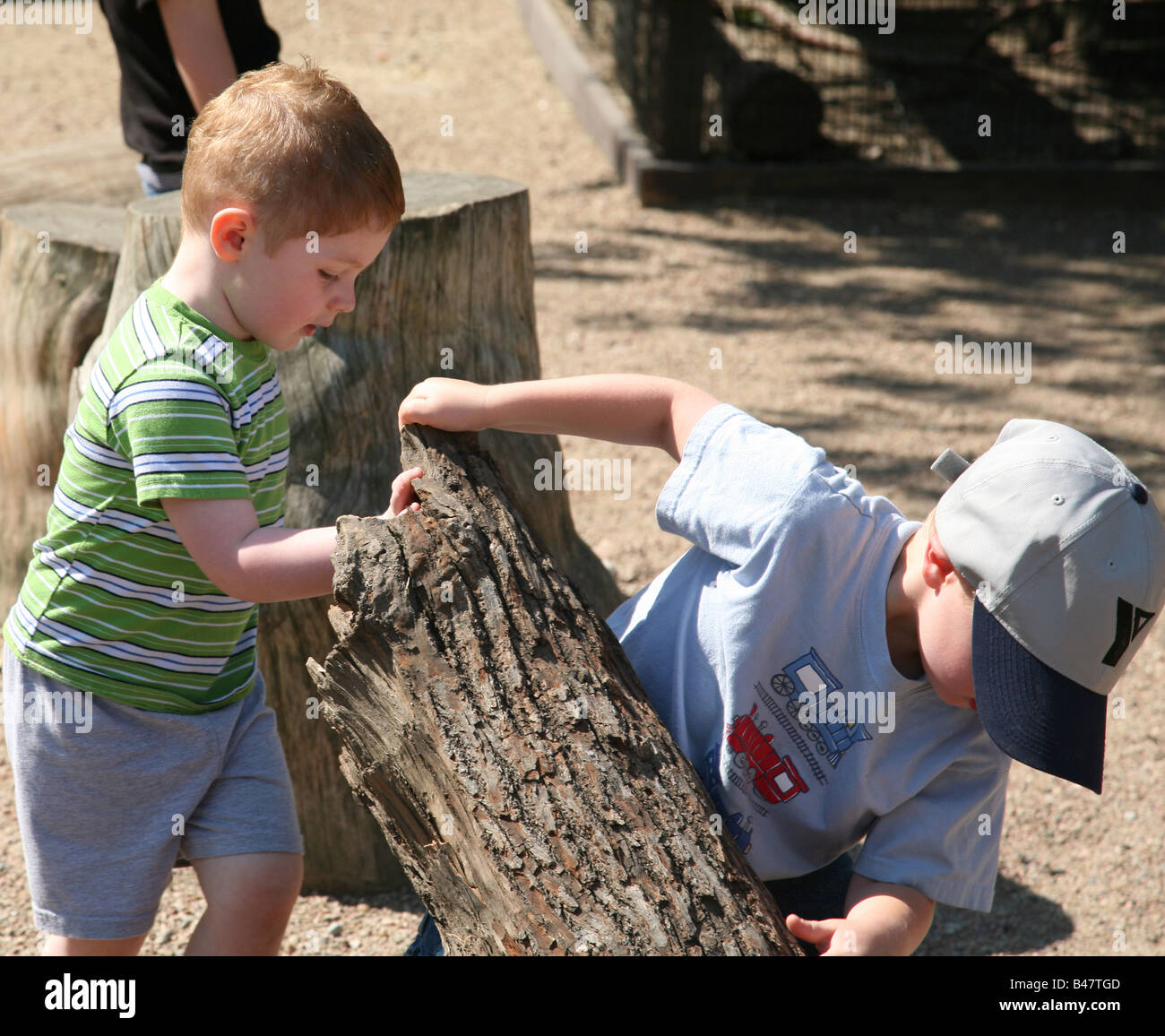 Boys at Work Stock Photo - Alamy