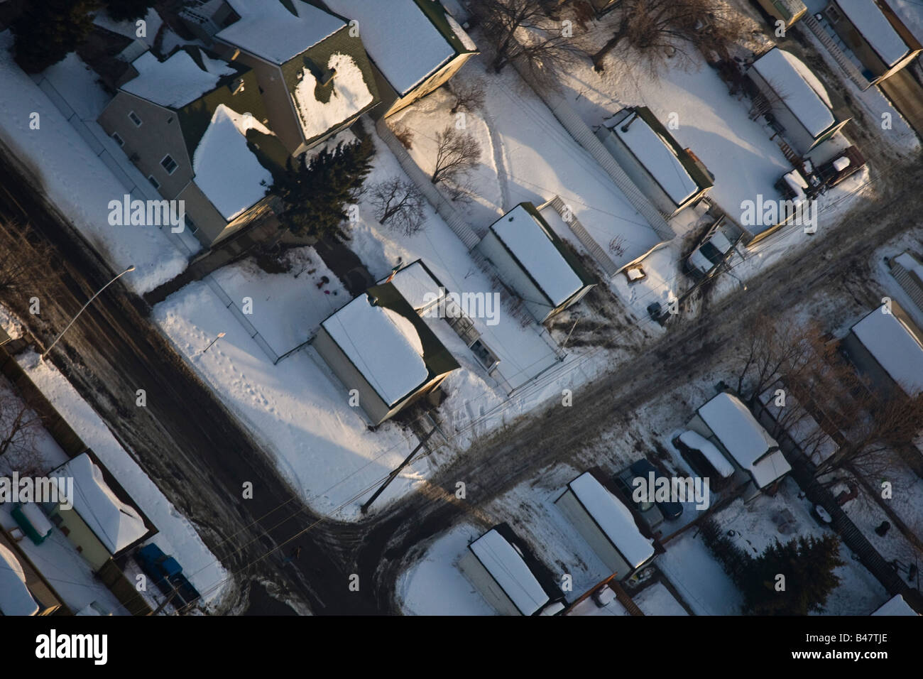 Snow covered rooftops Stock Photo - Alamy