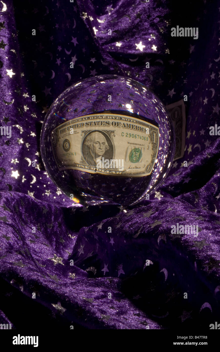 US dollar in crystal ball Stock Photo - Alamy