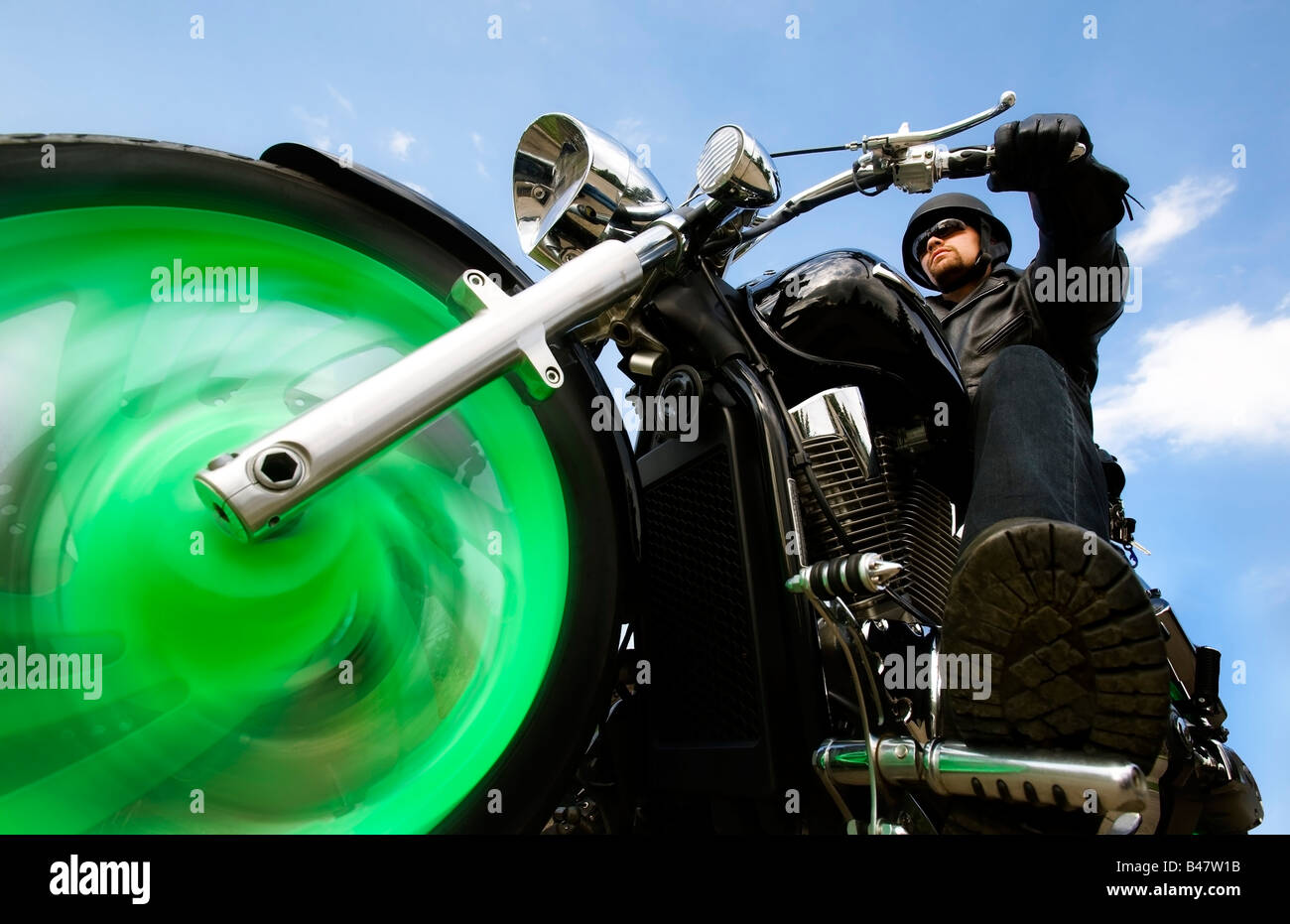 Biker riding motorcycle low angle hi-res stock photography and images ...