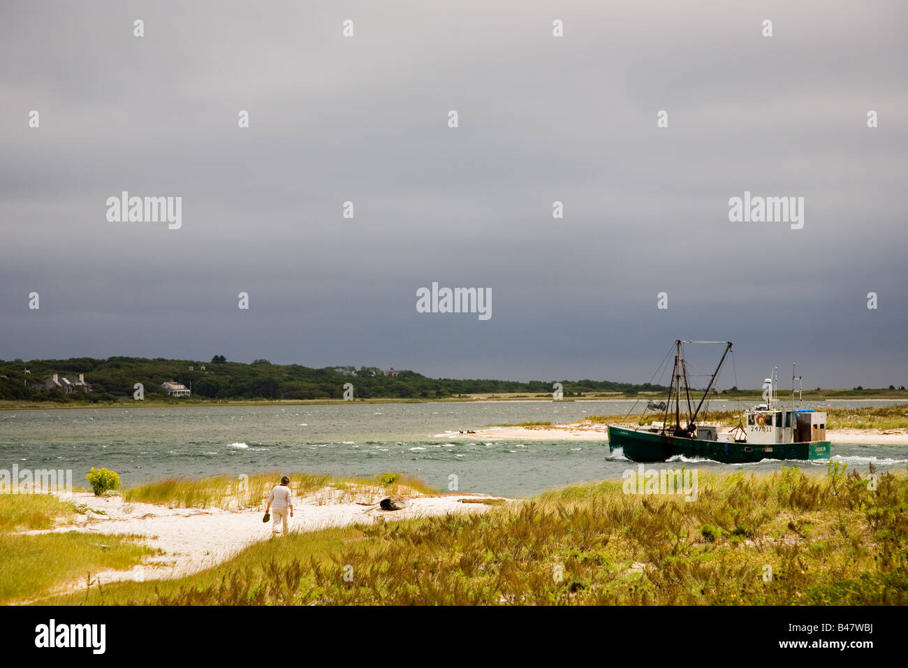 Fishing boat returning to harbour at Chatham, Cape Cod, USA Stock Photo ...