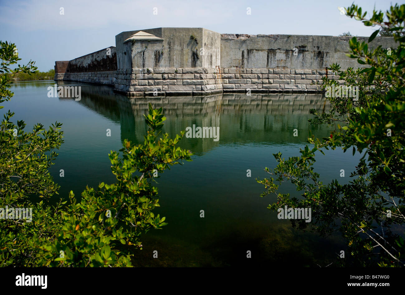 Corner of fortress wall with lagoon moat at historic Fort Taylor Key ...