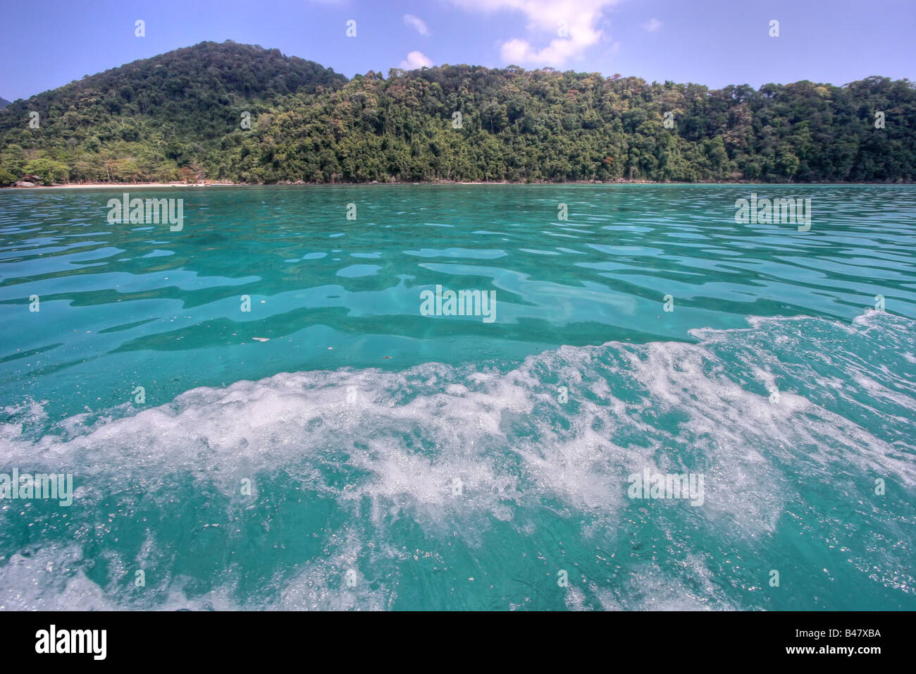 undulations of a boat on the surface of the andaman sea ko surin island ...