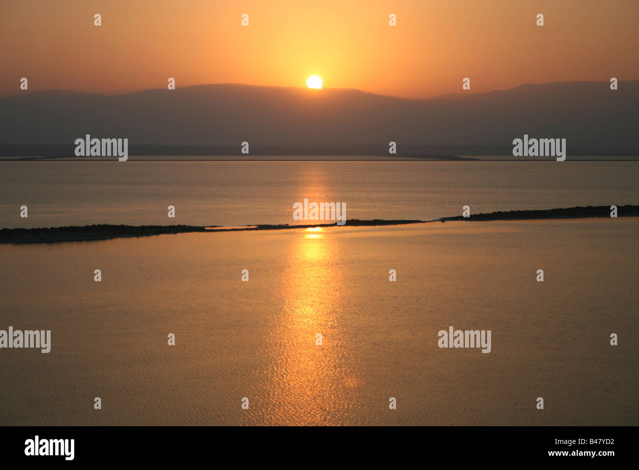 Israel Dead Sea sun rise over the mountains Stock Photo - Alamy