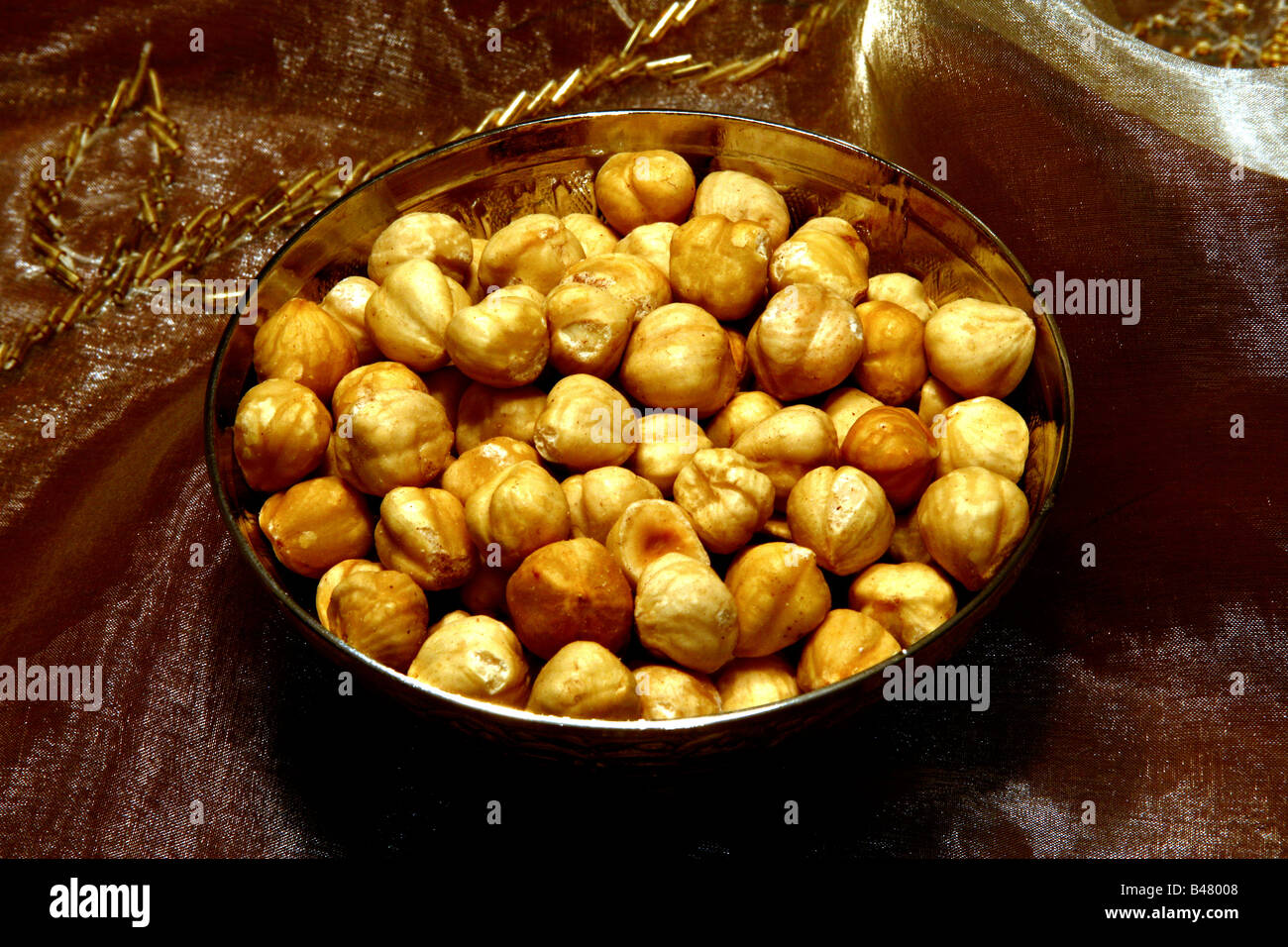 A Cup of Hazelnuts Stock Photo - Alamy