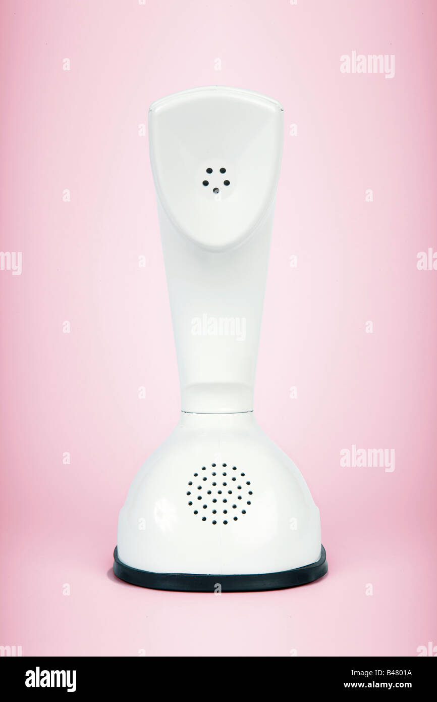Stylish retro telephone from the sixties isolated on pink background ...