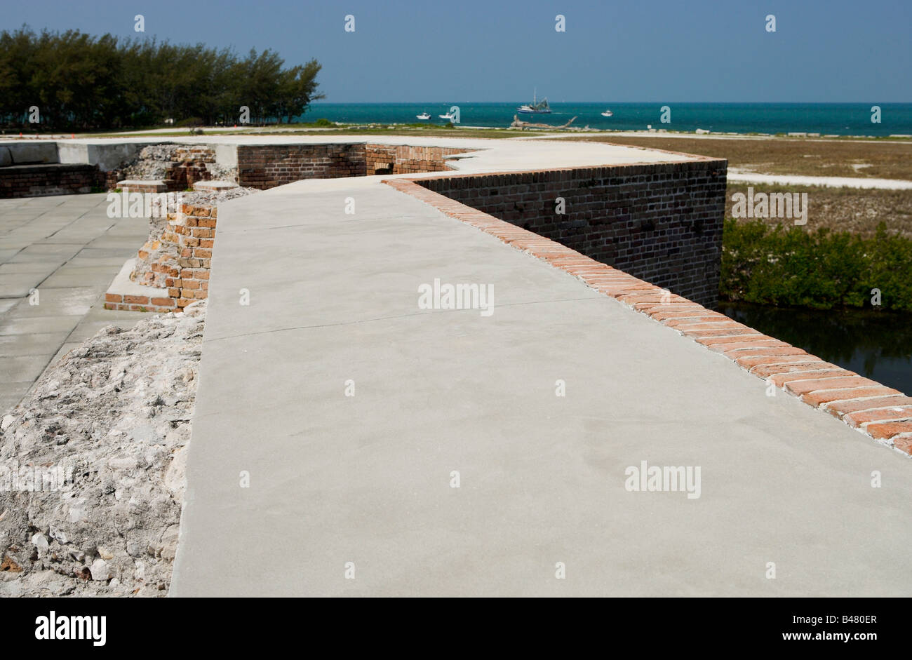 Corner of fortress wall with lagoon moat at historic Fort Taylor Key ...