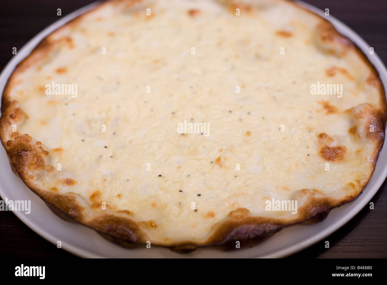 Four cheese pizza Stock Photo - Alamy