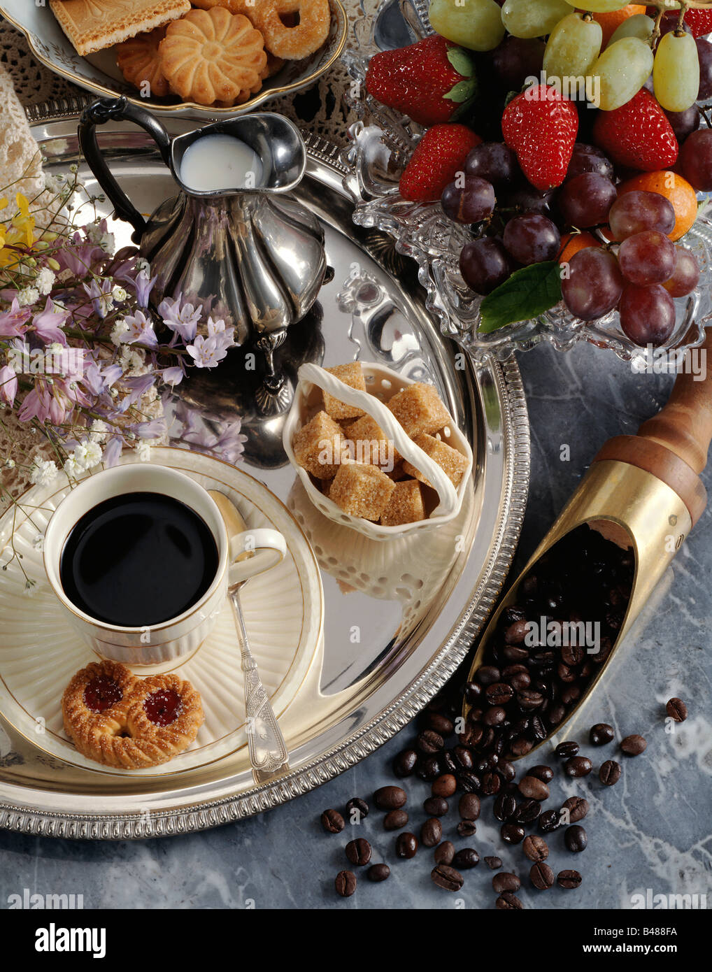 Black coffee and fruit editorial food Stock Photo - Alamy