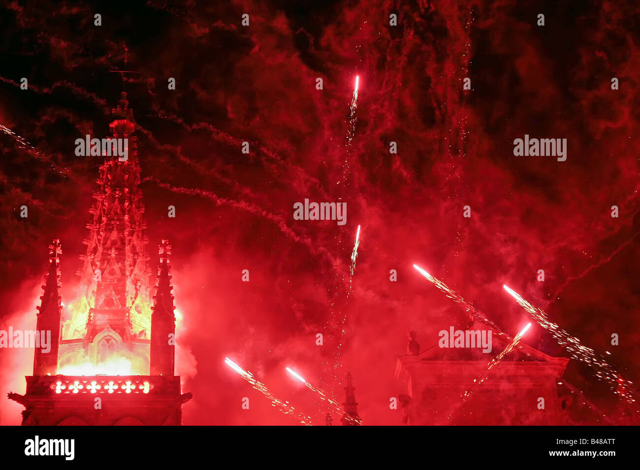intense red fireworks on a christian church with dense smoke Stock ...