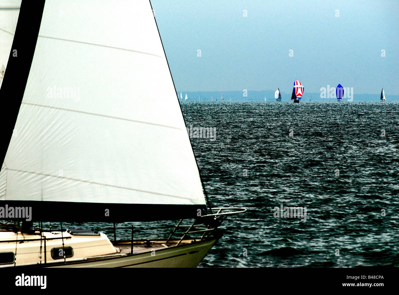 Sailing boats competing in a race on the Solent, English Channel Stock ...