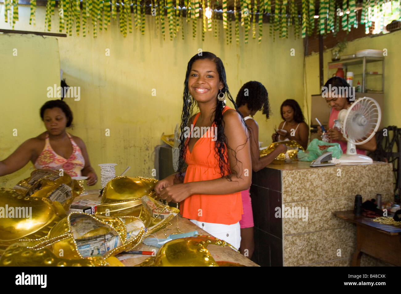 Local Brazilian women and girls prepare costumes for the Rio Carnival ...