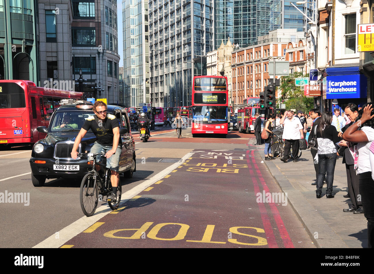 Busy London traffic, Commercial street, London City, UK Stock Photo ...