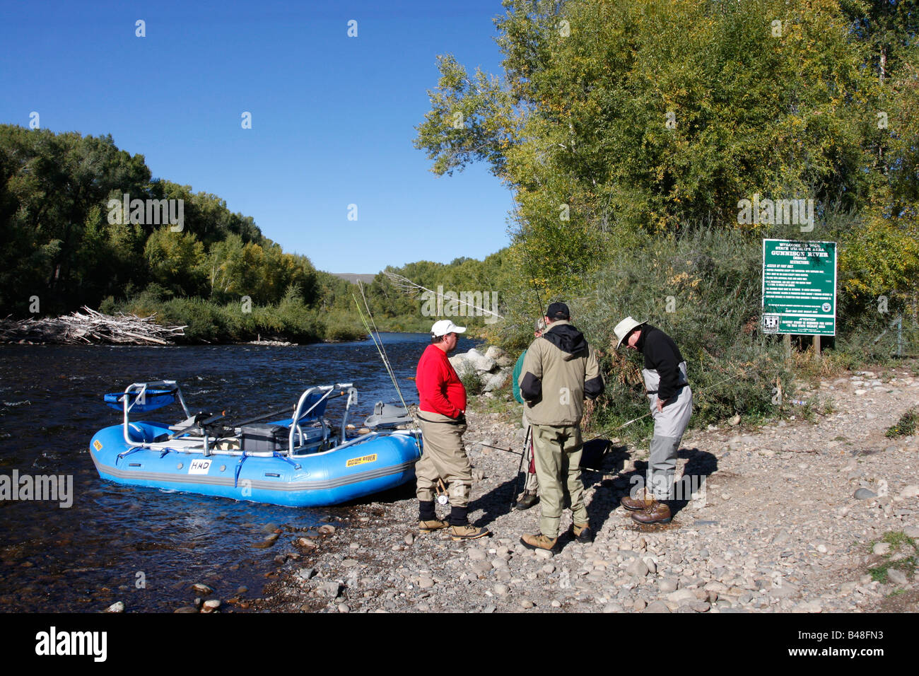 Group of fishermen preparing to go drift fishing on the Gunnison River ...