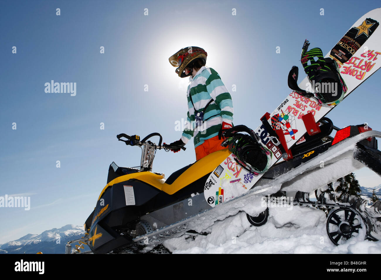 boy on a snowmobile Stock Photo - Alamy