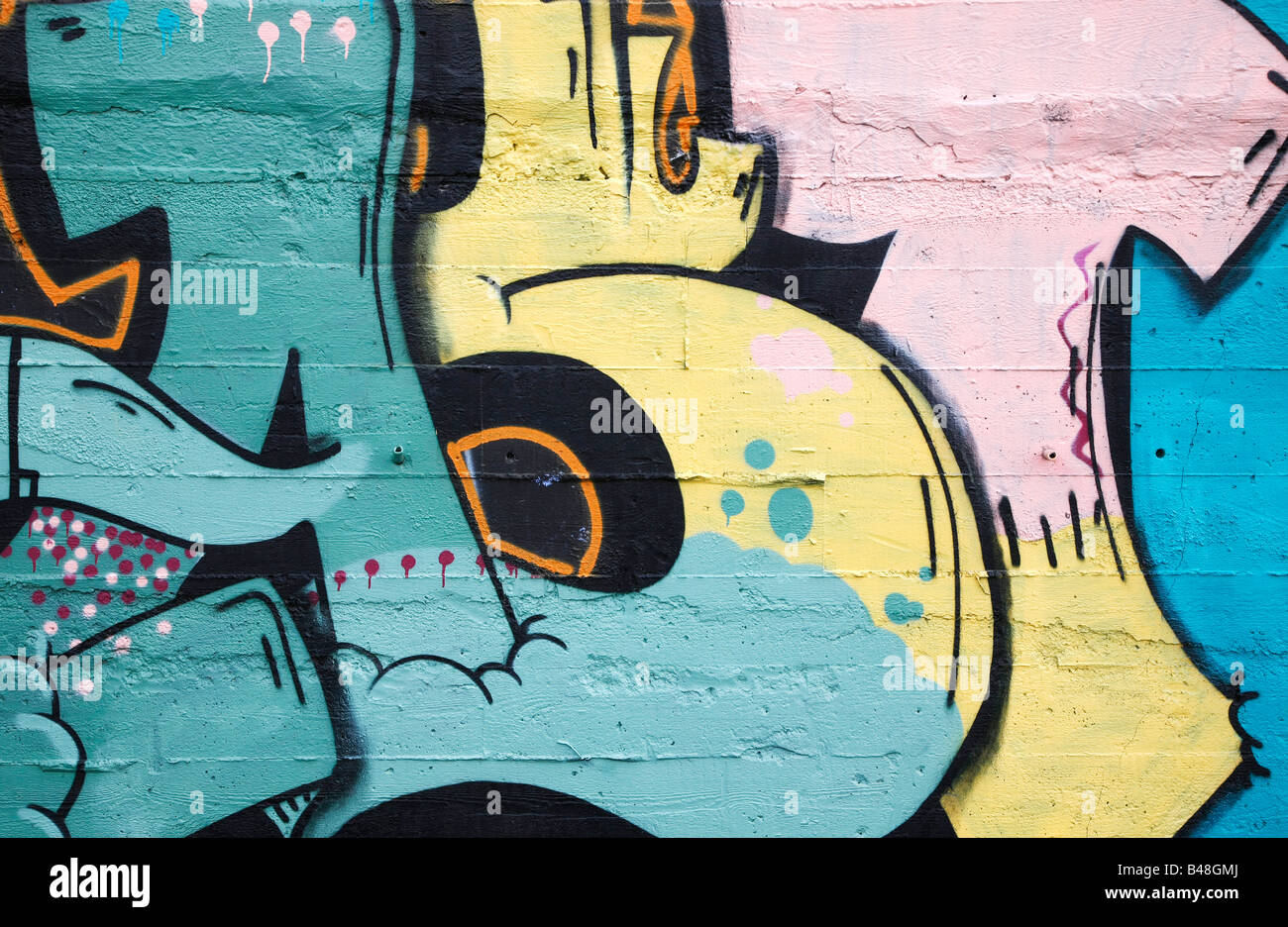 Inner city background with colorful graffiti Stock Photo - Alamy