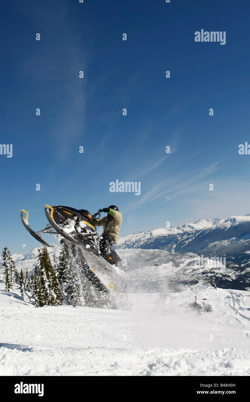 jumping a snowmobile catching big air Stock Photo - Alamy