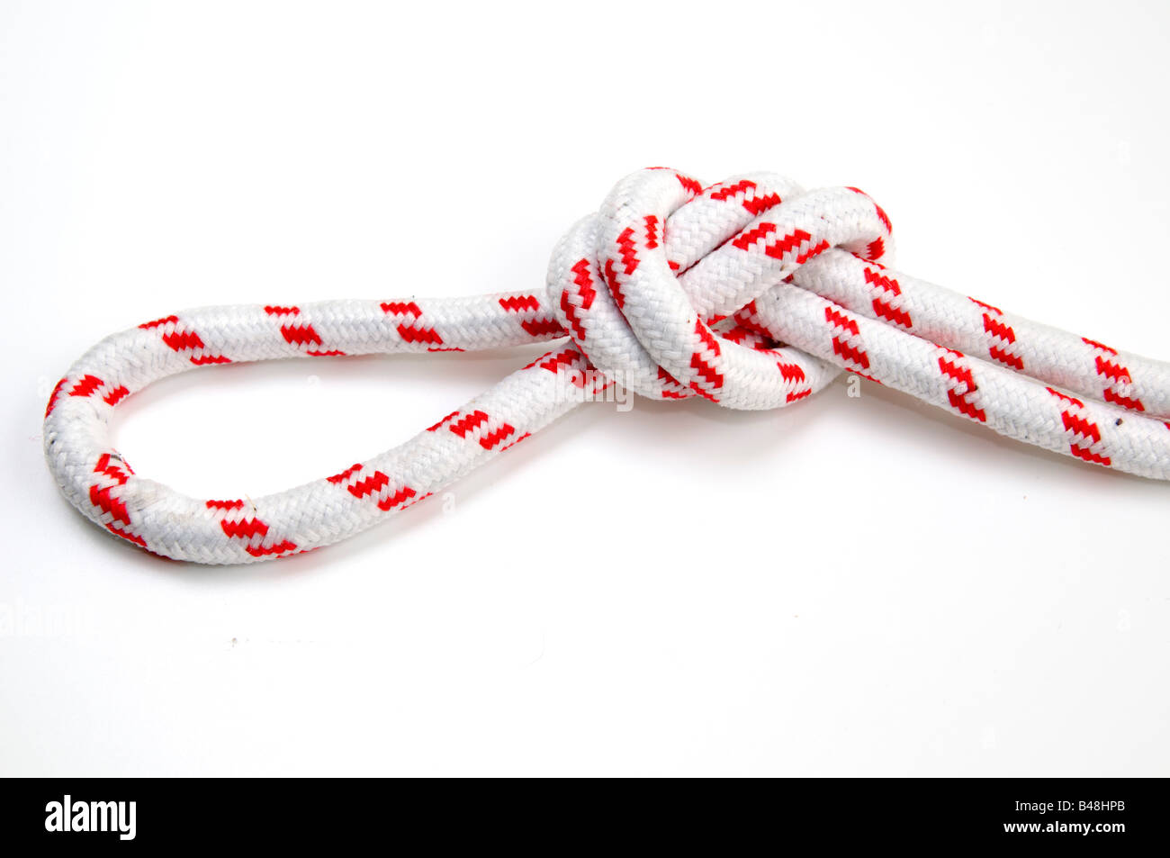 Overhead loop knot on white background simple way of forming a loop in ...