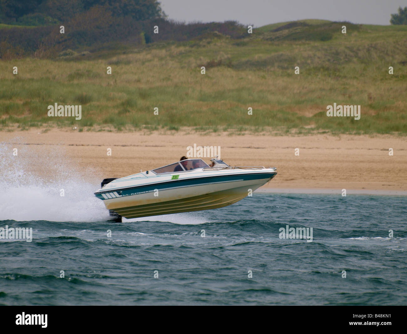Men in a speedboat hi-res stock photography and images - Alamy