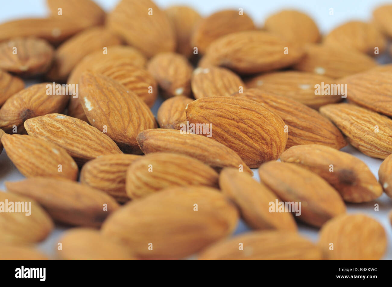 Almonds close up Stock Photo - Alamy