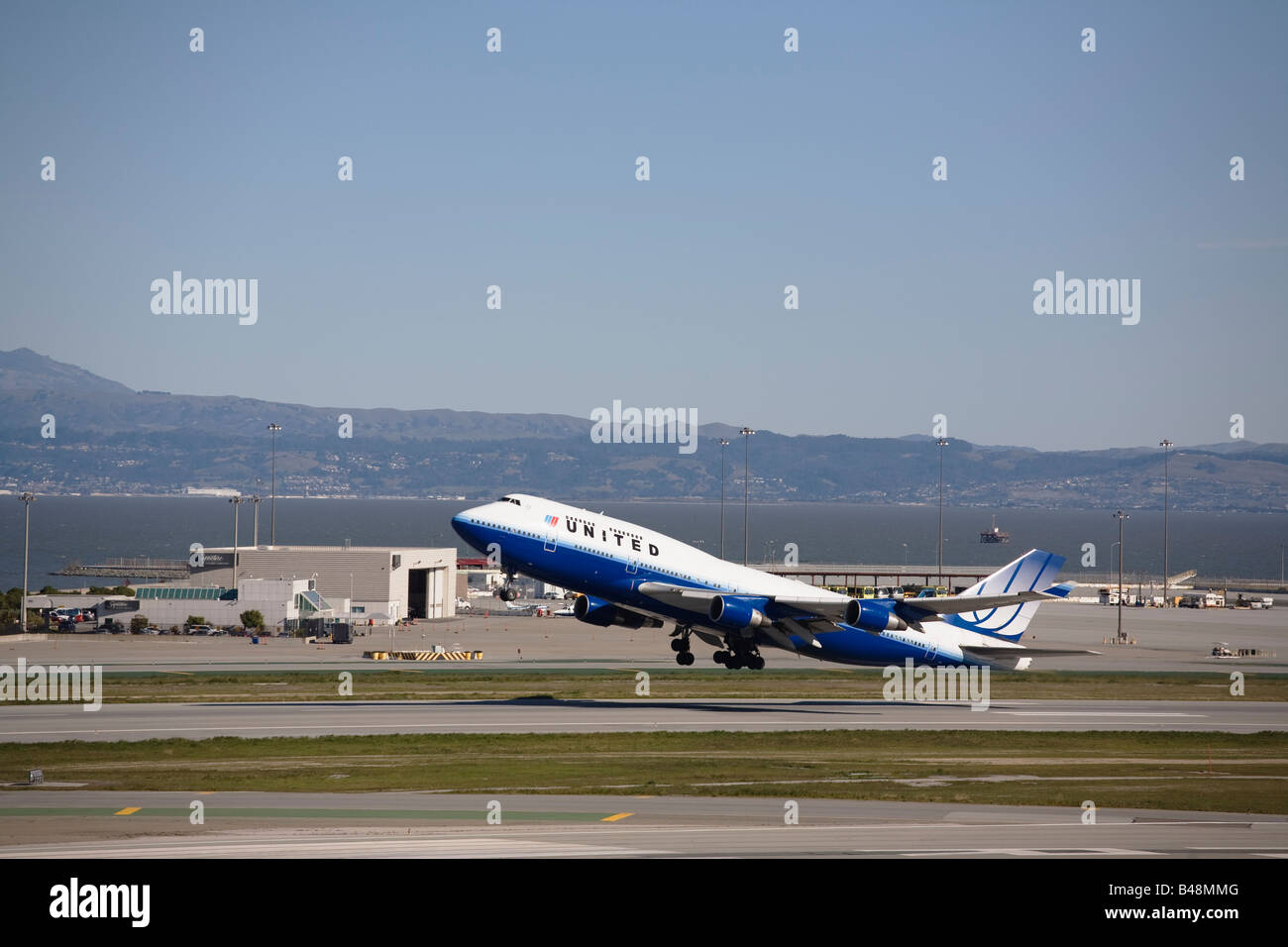 United Airlines UAL Boeing 747 jumbo jet airplane taking off at San ...