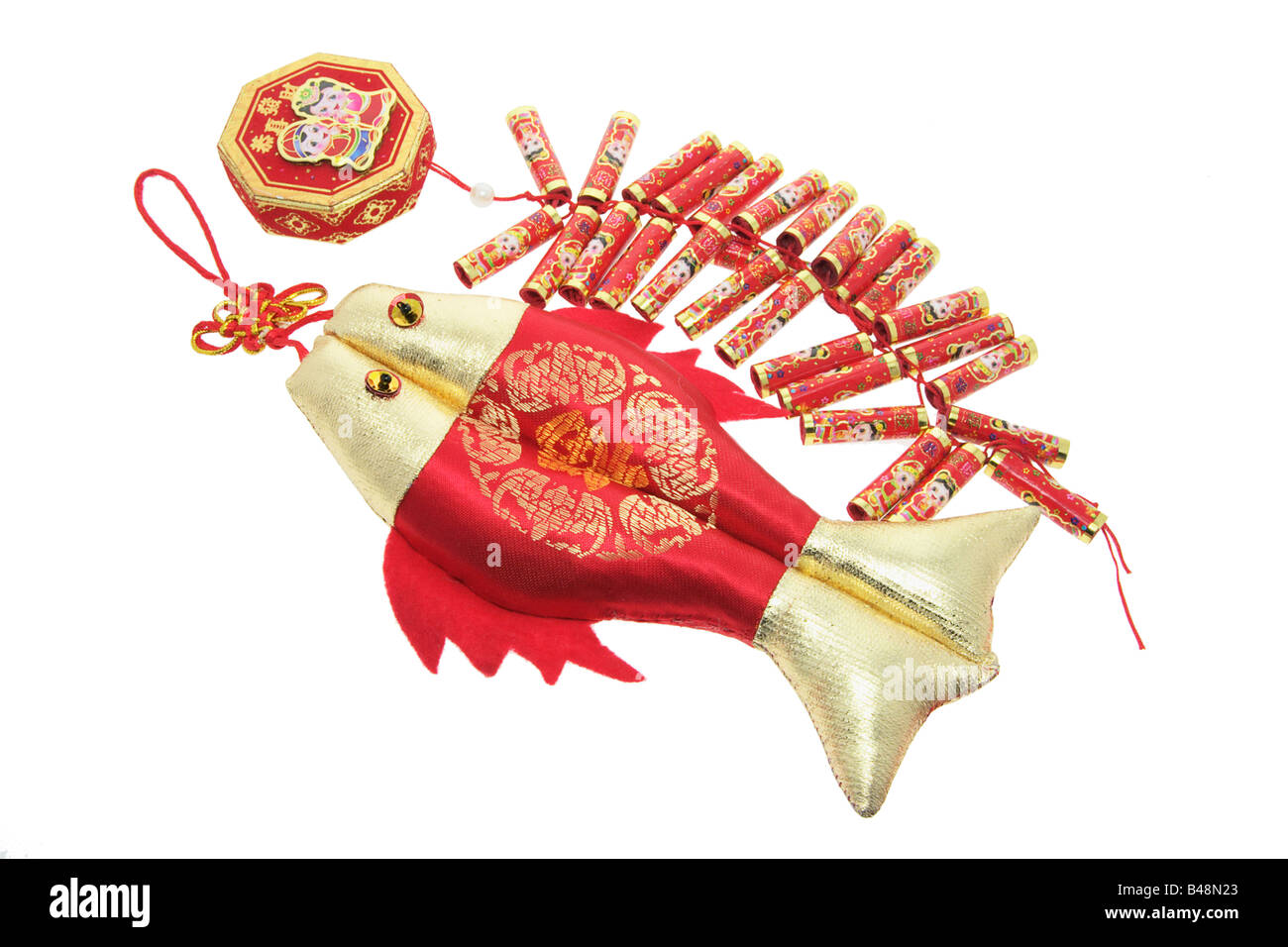 Chinese Fish Charm and Firecrackers Stock Photo - Alamy